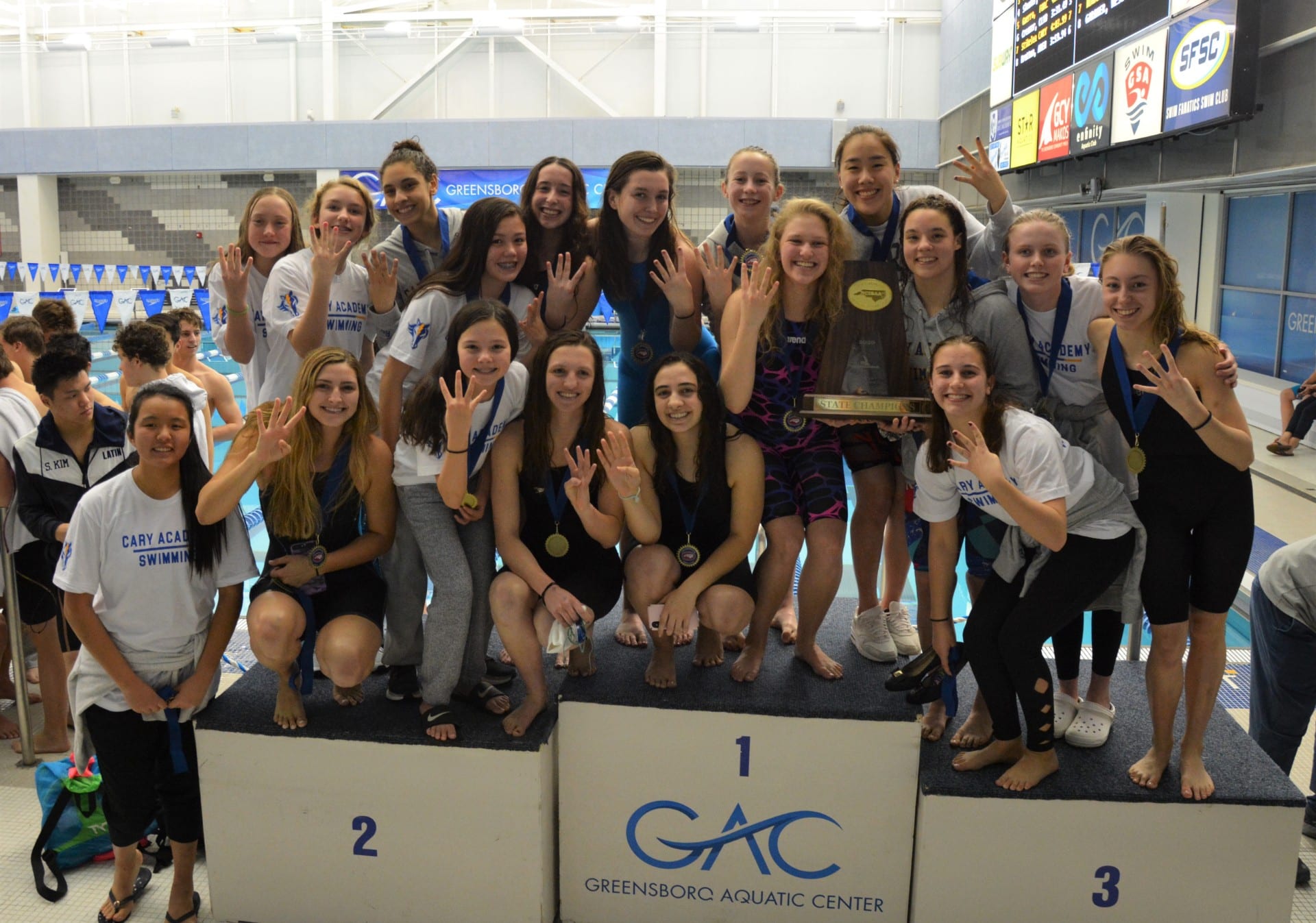 Varsity girls swimming takes fouth consecutive State title - Cary Academy