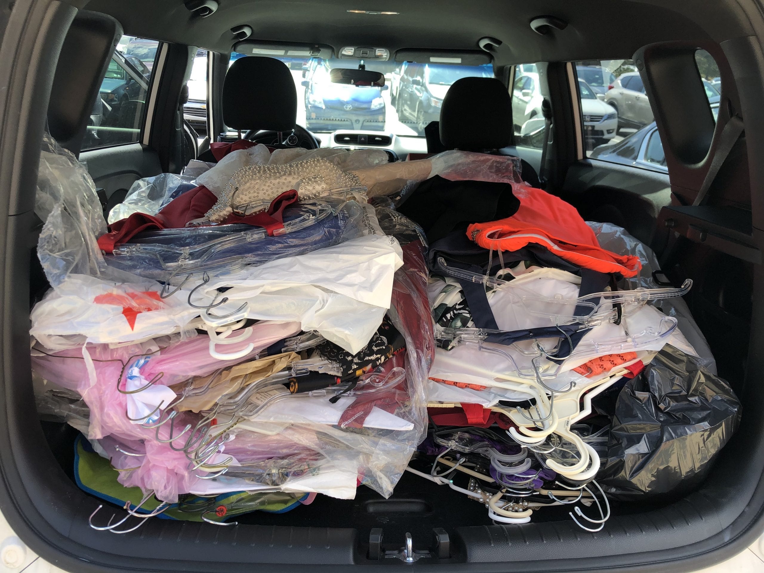 Prom Dress Drive collects 70 dresses for a community in need - Cary Academy